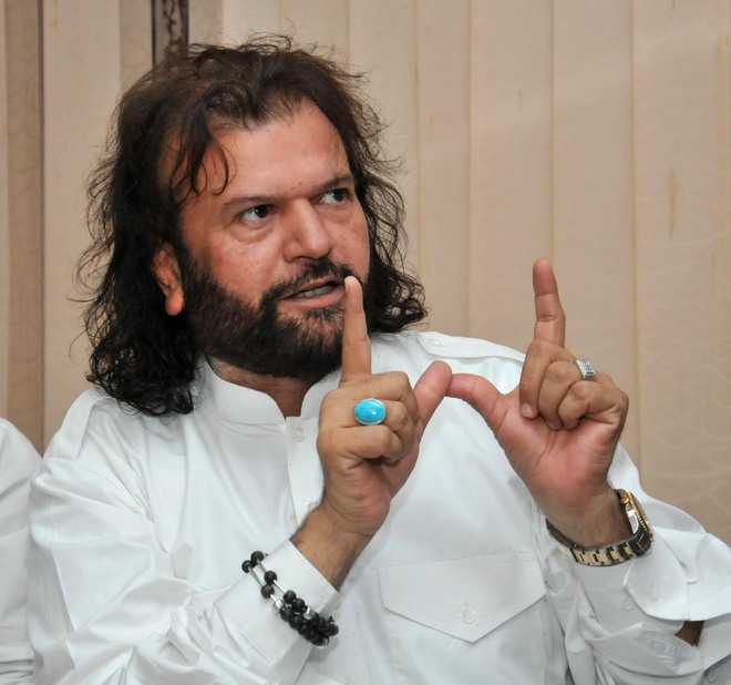 Court discharges BJP MP Hans Raj Hans in case of non-disclosure of ...